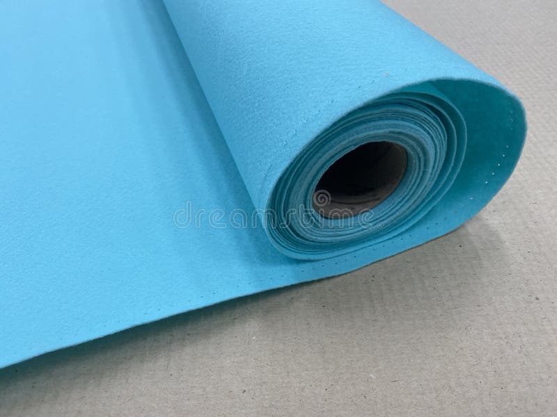 A Round Roll of Blue Textiles on the Table. Felt Fabric is Blue Stock ...