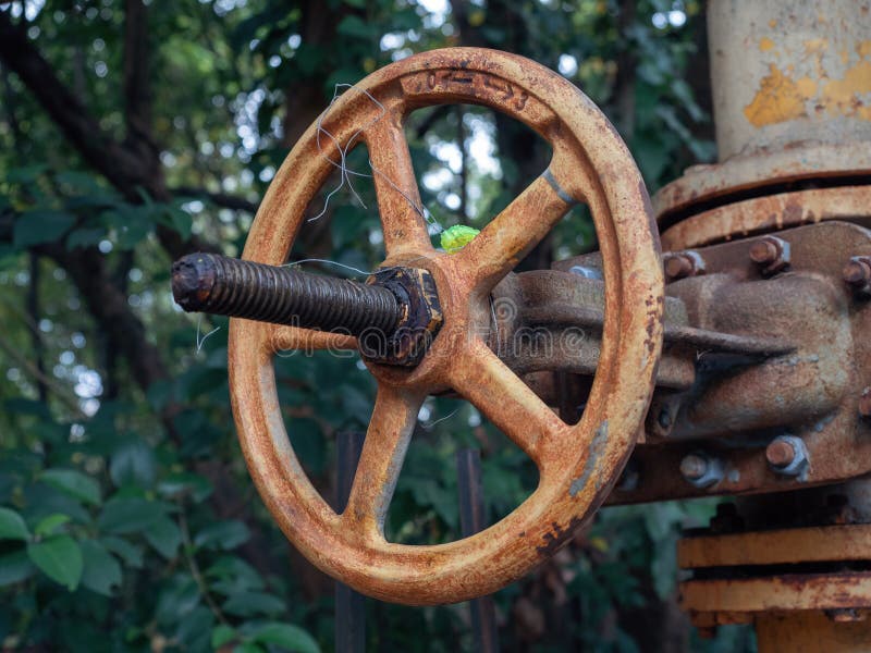 Round Rusty Valve on a Pipe in the Street Stock Image - Image of lock ...