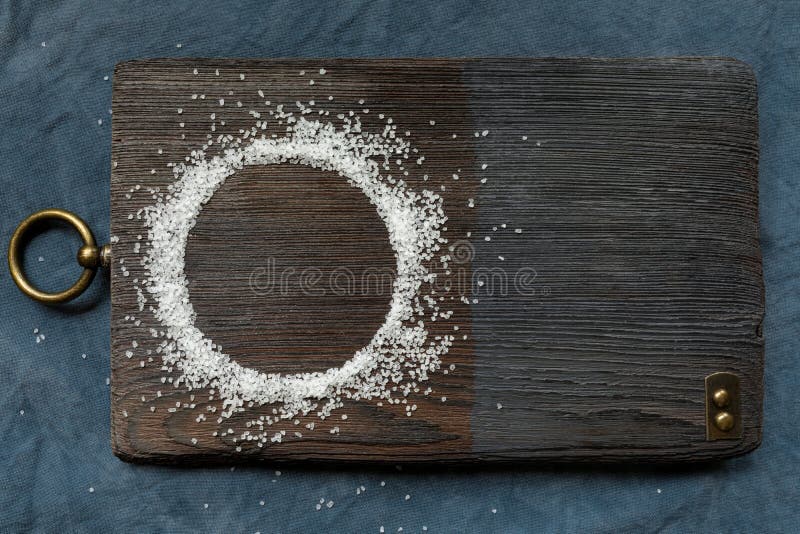 Round Salt Frame on an Old Wooden Board with Metal Decorative Elements ...