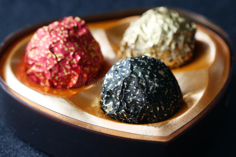 Round Shape Dark Chocolate in a Heart Shape Box Stock Image - Image of ...