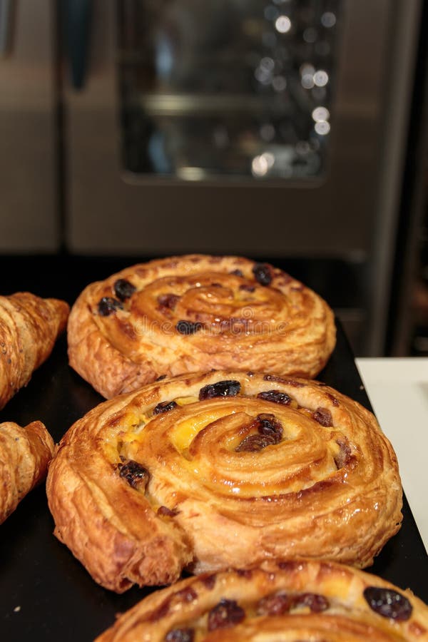Round Croissant with Pralines Chocolate Praline in Plate Stock Image ...