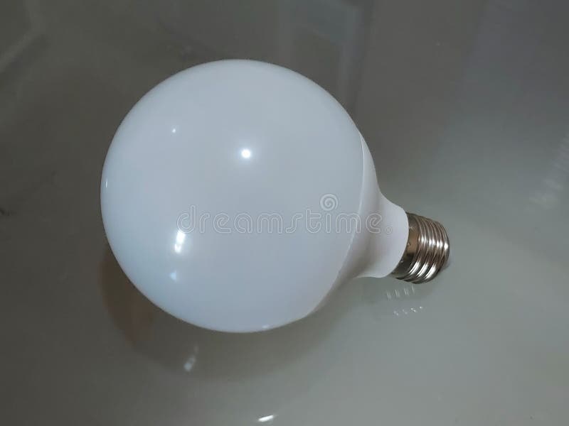 A Round Shape LED Bulb with Head Stock Photo - Image of head, round ...