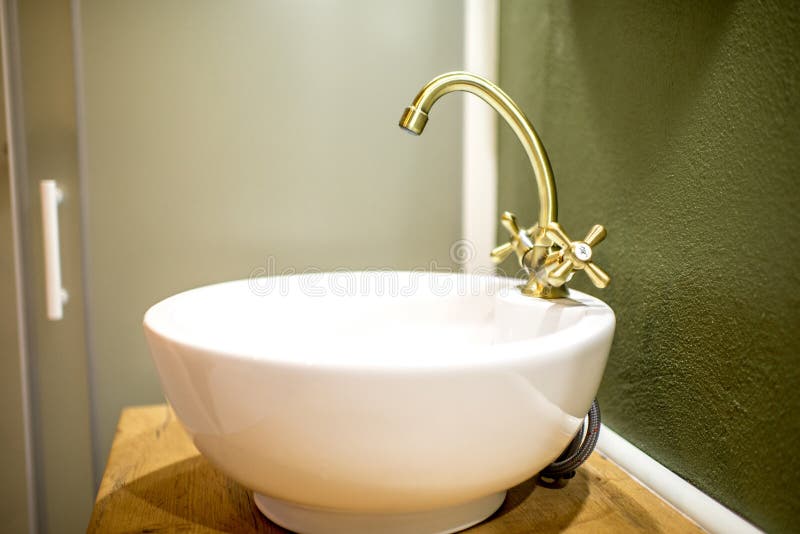 Round sink with retro tap stock photo. Image of metal - 130479042