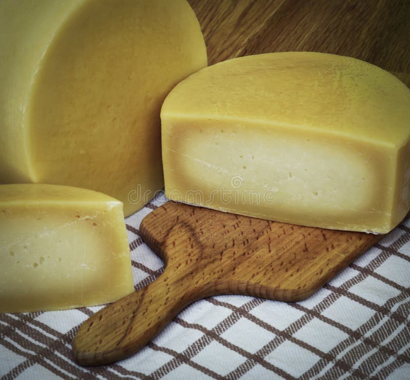 Round sliced hard cheese stock photo. Image of slovak - 65646392