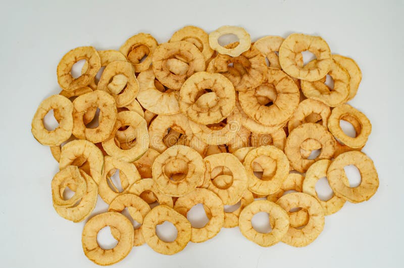 Round Slices of Dried Apples on a White Background. Apple Chips Stock ...