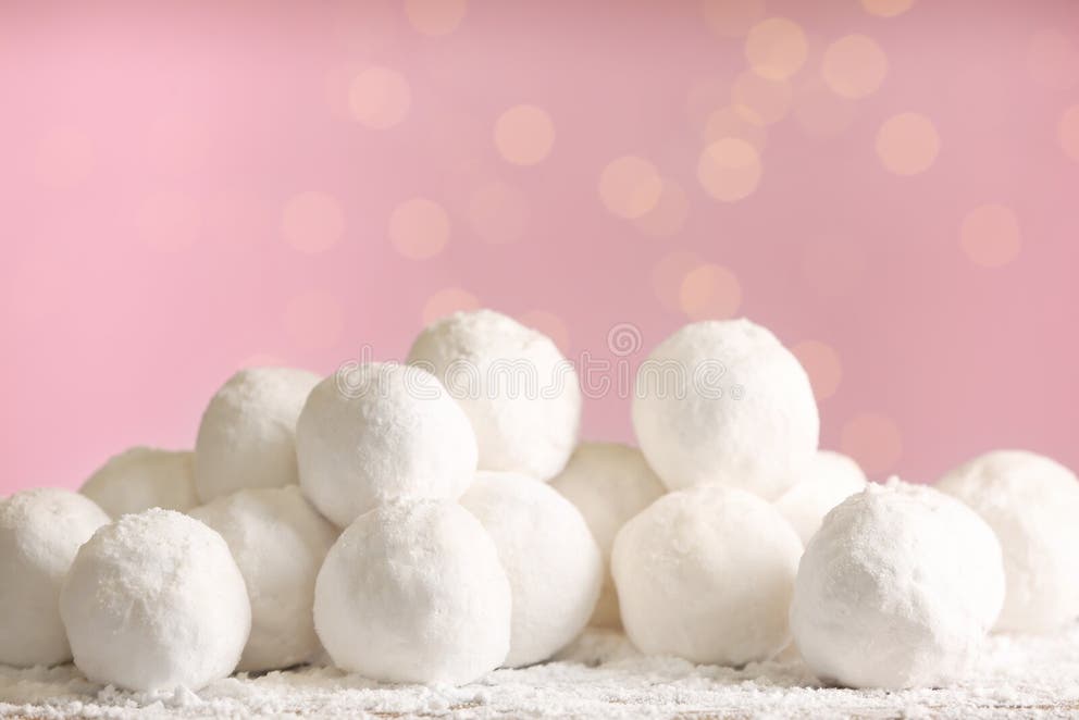 Round Snowballs on Table Against Blurred Lights Stock Photo - Image of ...