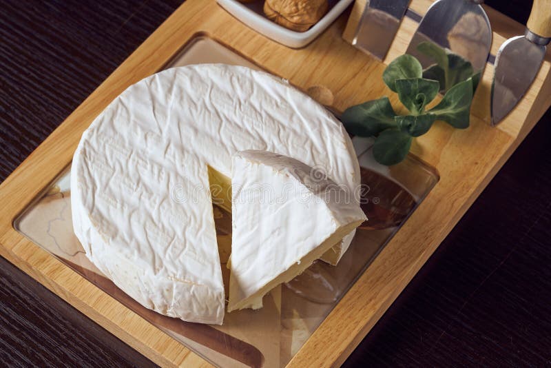 Round Soft Cheese, with a Section Cut Stock Photo - Image of brie ...