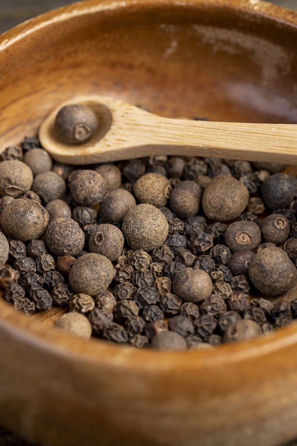 Round Spices of Black Pepper and Other Peppers on the Table Stock Photo ...