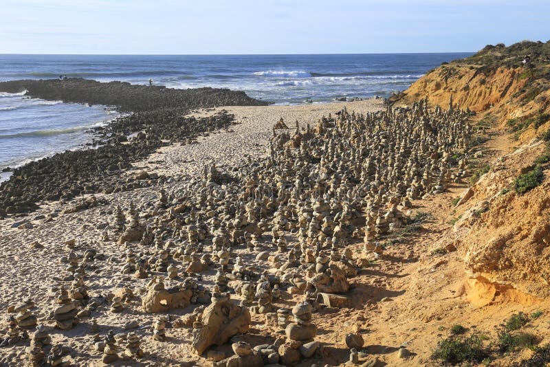 Round Stacked Stones on the Shore Stock Photo - Image of peaceful ...