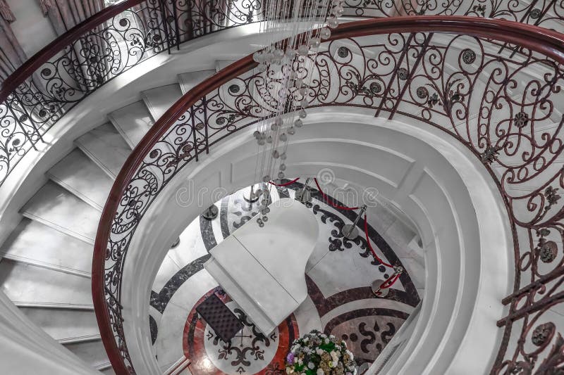 Round Staircase Vintage Style with a White Piano Stock Image - Image of ...