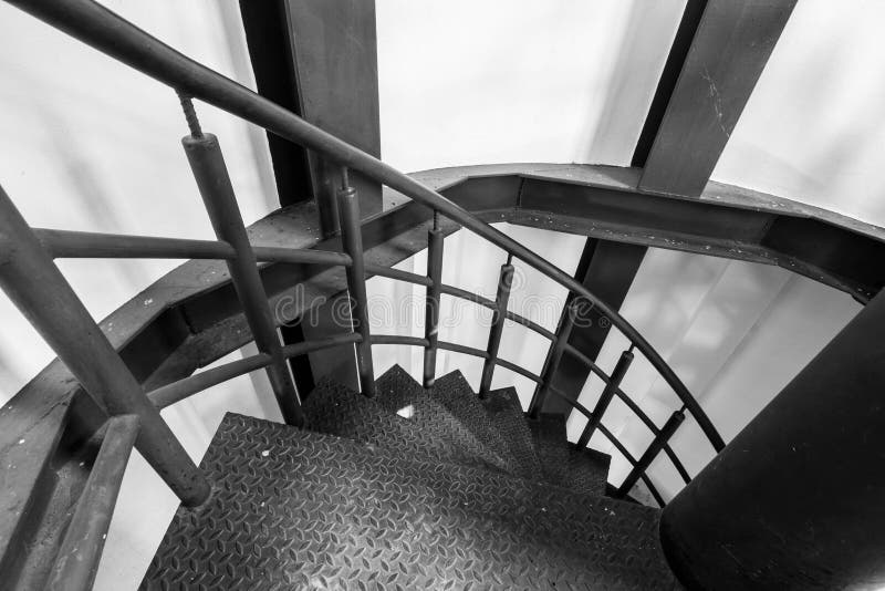 Round stairs in old metal stock photo. Image of france - 53433234