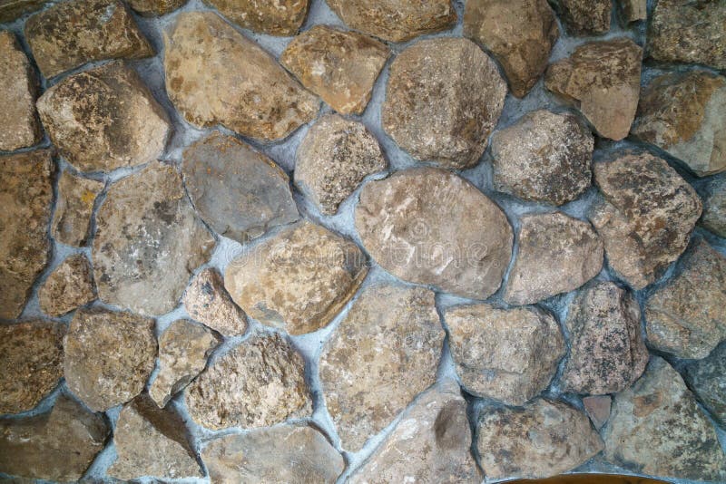 Round stone wall stock photo. Image of rough, texture - 260122072