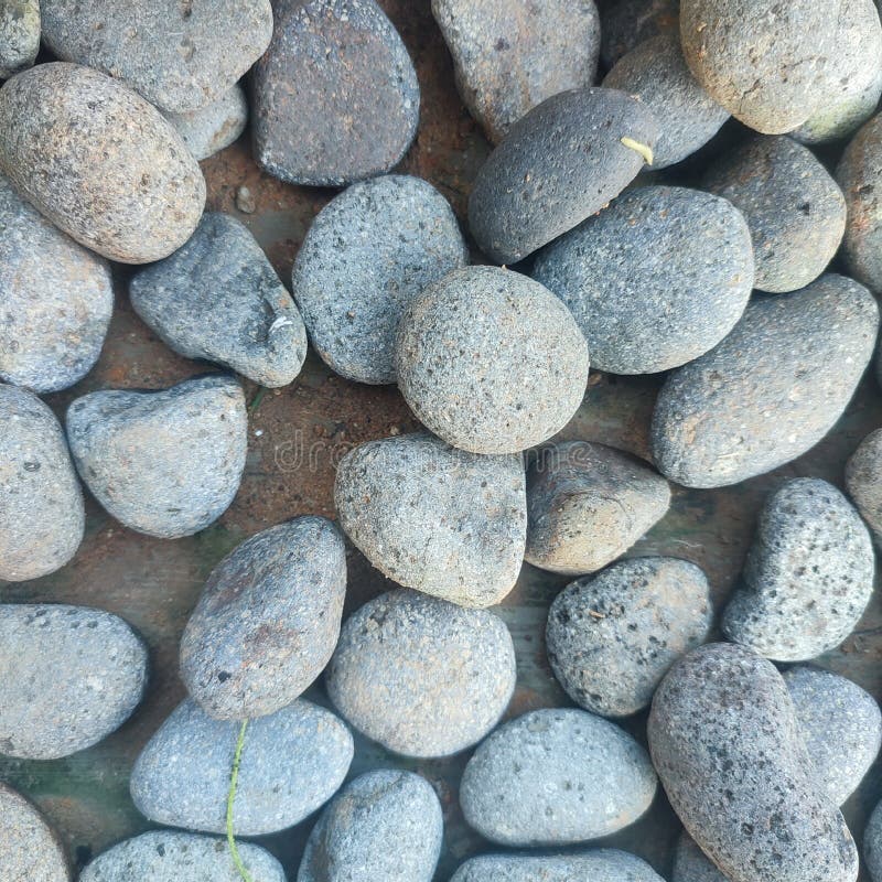 Round Stones Lay on the Ground Stock Photo - Image of brickwork, wall ...