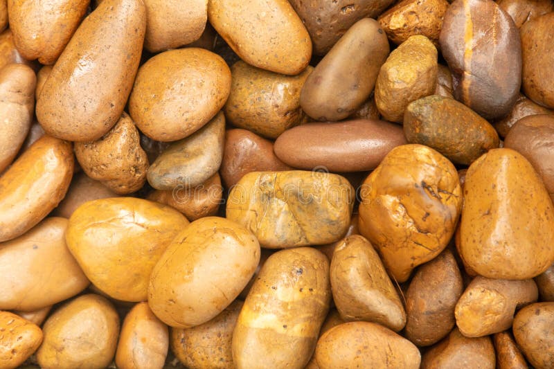 Round Stones in the Wall As an Abstract Background. Texture Stock Image ...