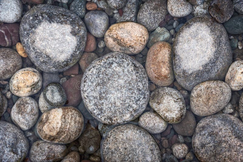 Round Stones in the Water, Background Pattern. Stock Image - Image of ...