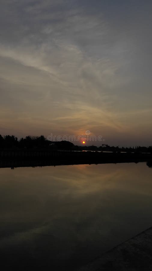 Round sun in the morning stock image. Image of reflection - 278152791