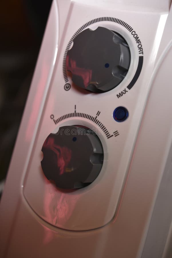 Round Switches on a White Radiator. the Control Panel Stock Image ...
