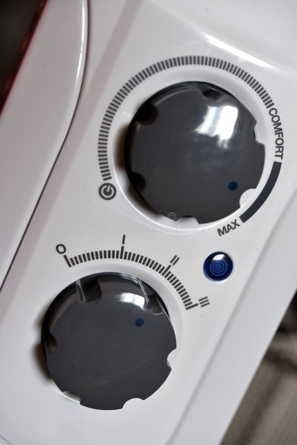 Round Switches on a White Radiator. the Control Panel Stock Image ...