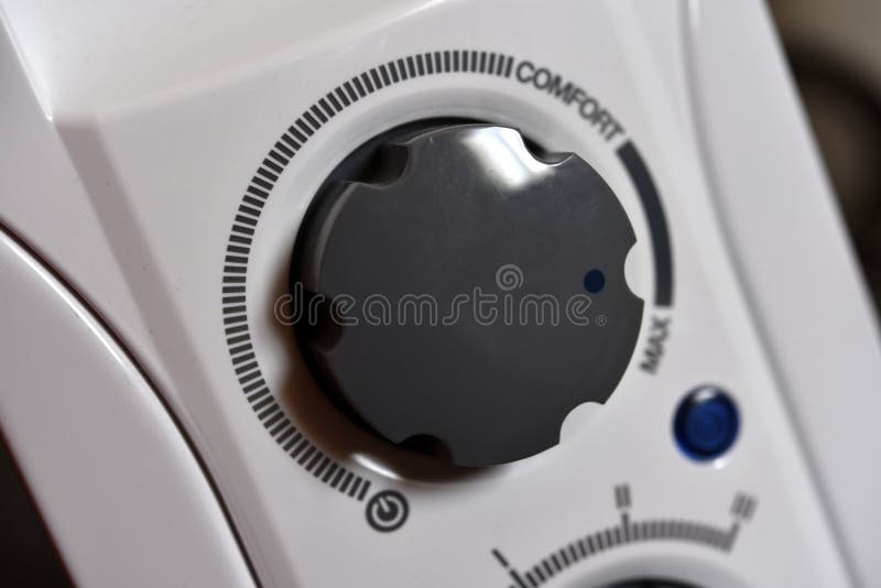 Round Switches on a White Radiator. the Control Panel Stock Photo ...