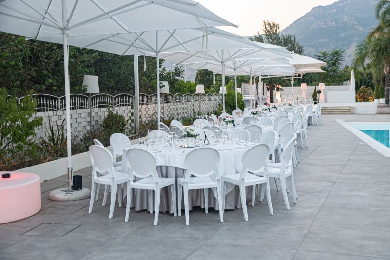 Round Table in a Restaurant on a Summer Terrace Under the Open Sky at ...
