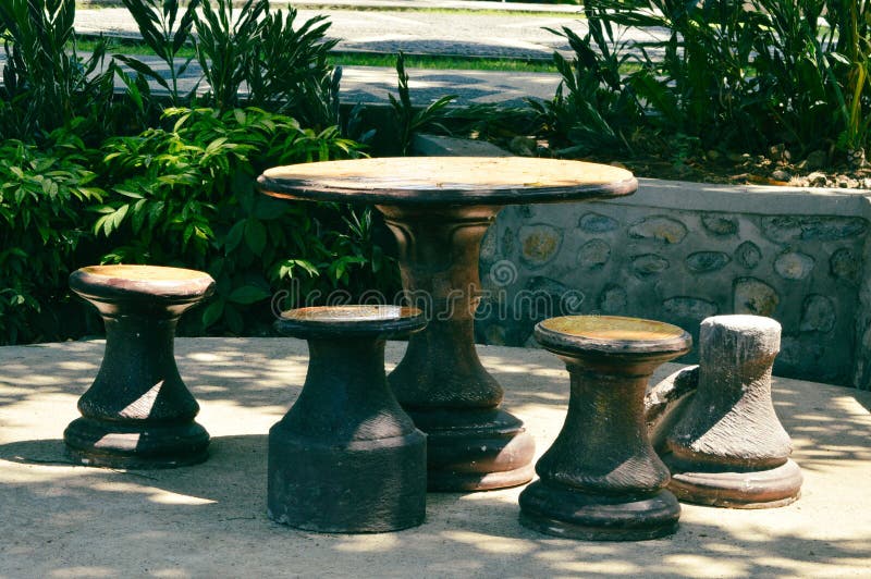 Round Table Surrounded by Concrete Seats with Ceramic Surface for ...