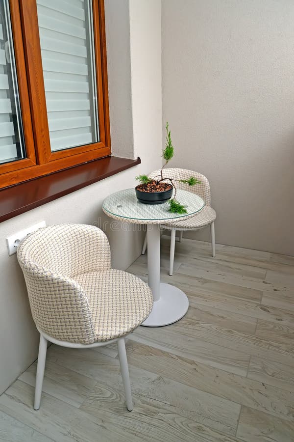 Round Tea Table and Two Chair Chairs on the Loggia Stock Photo - Image ...