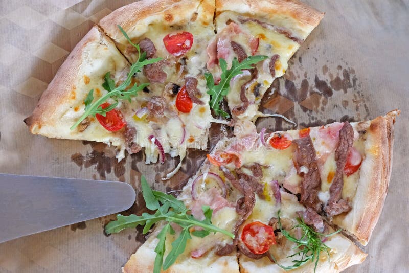 Round Thin-crust Pizza with Meat, Mozzarella, Arugula and Cherry ...