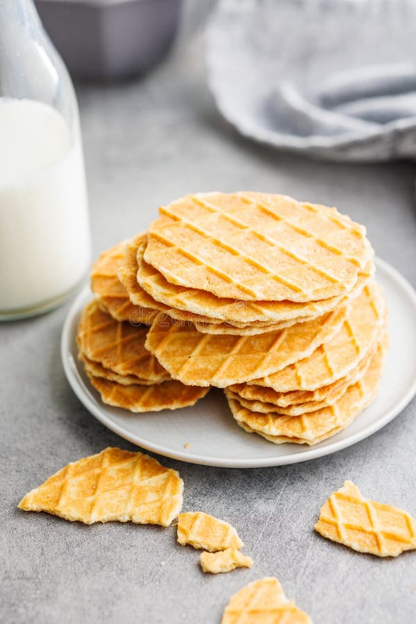 Round Waffle Biscuits on Plate on Kitchen Table Stock Photo - Image of ...