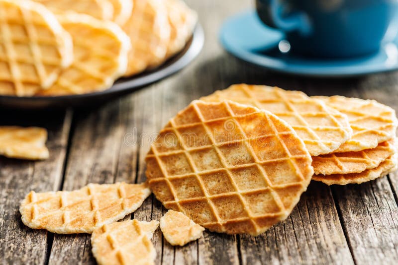 Round Waffle Biscuits on Wooden Table Stock Image - Image of biscuit ...