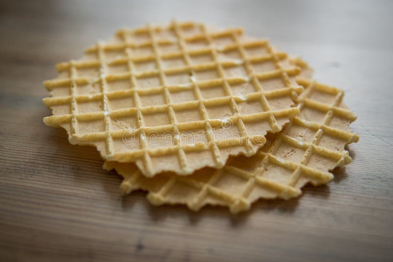 Round wafer on a table stock image. Image of dessert - 109412821