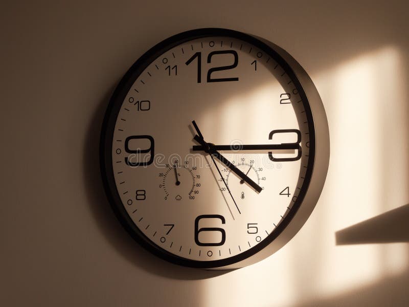 Wall Clock with Warm Light and Shadow Effects Stock Photo - Image of ...