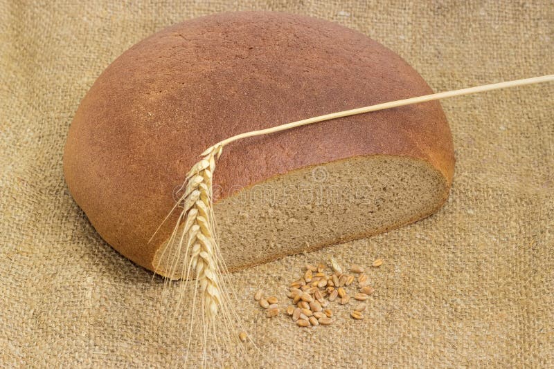 Round Wheat and Rye Bread, Wheat Spike and Wheat Grain Stock Photo ...