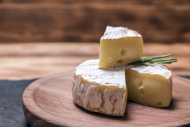 Round White Camembert Cheese on the Table Stock Photo - Image of ...