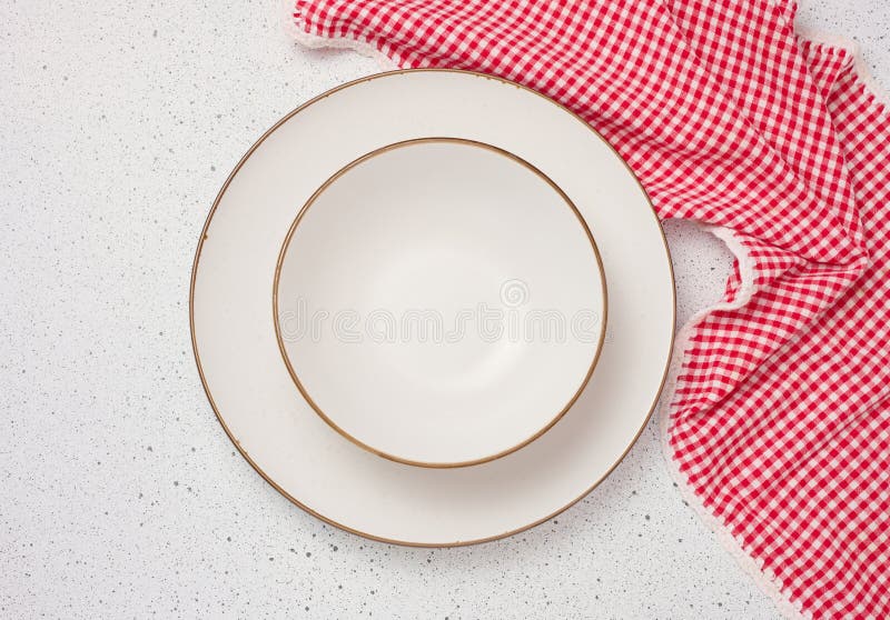 Round White Ceramic Empty Plates and Red Kitchen Towel Stock Image ...