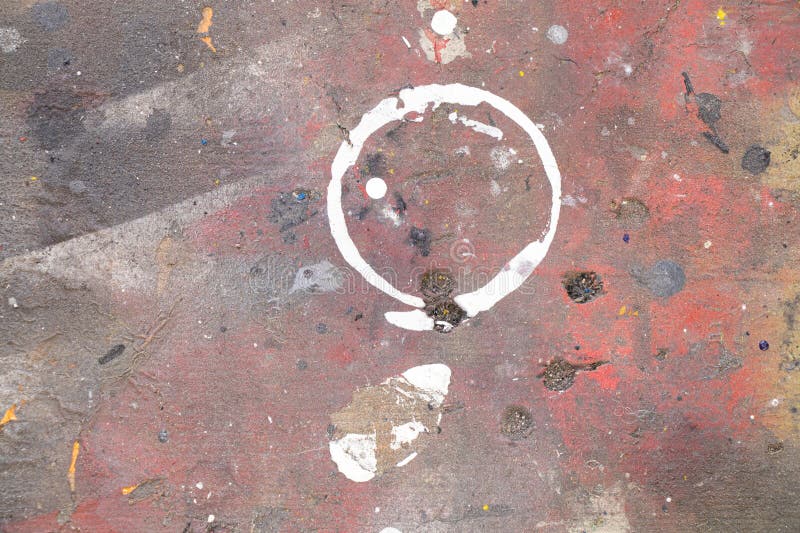 Round White Mark from a Standing Can on a Multi-colored Board in a ...