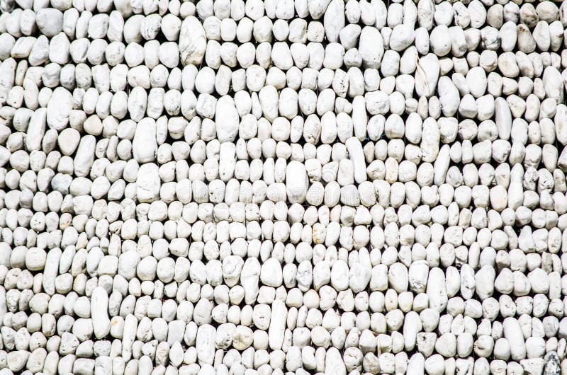 Round White Pebble Rocks Arrangement Wall Surface. Stock Image - Image ...