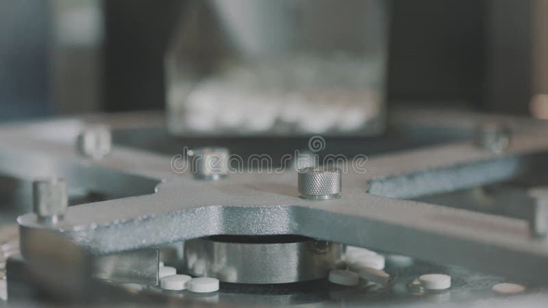 Round White Pills Close Up. Tablet Manufacturing Process Close-up. Lots ...