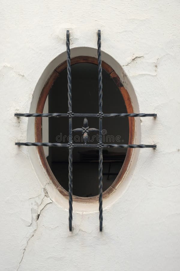Round Window with Iron Bars Stock Photo - Image of iron, facade: 294308006