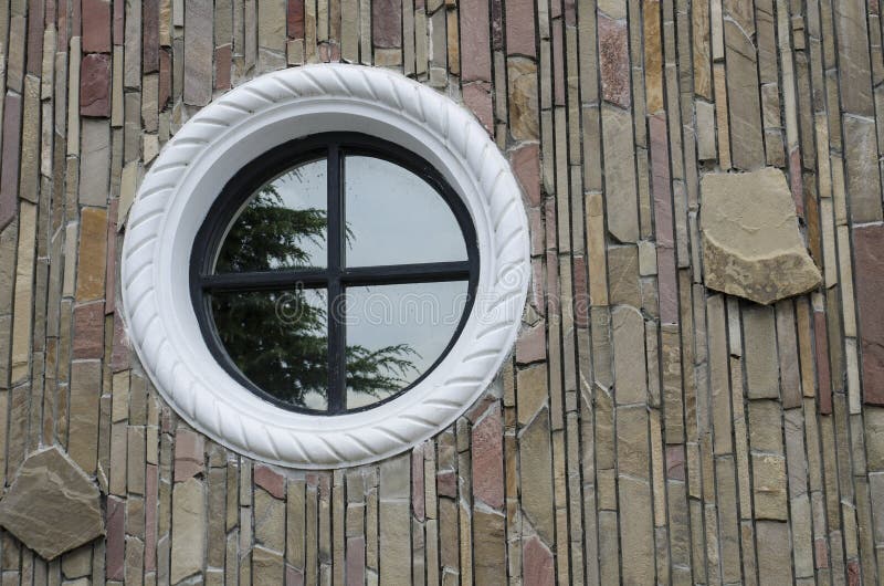 Round Window in Stone Wall on the Facade Stock Image - Image of ...