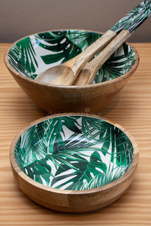 Round Wooden Bowls with Glossy Interiors Featuring Green Tropical Leaf ...