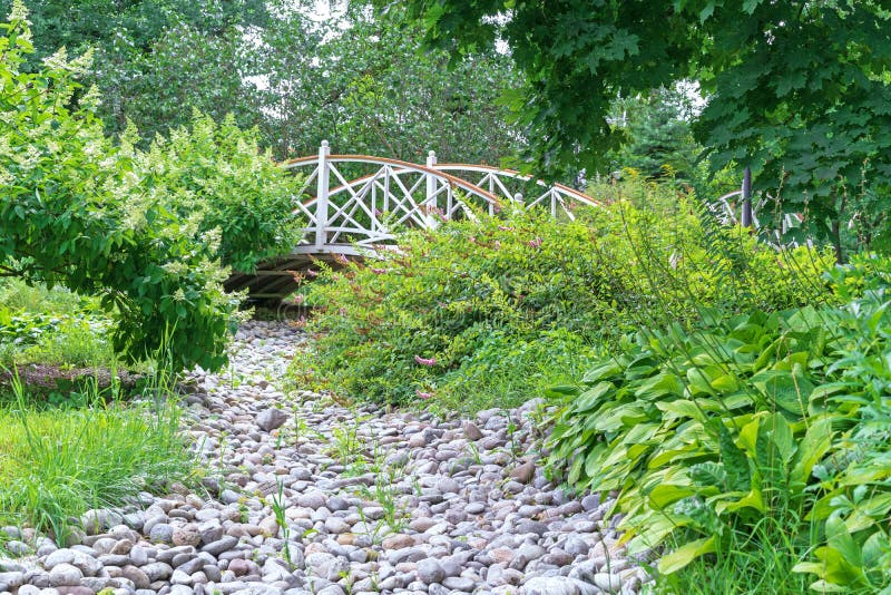 Round Wooden Bridge Over the Dry Bed of a Small River Stock Photo ...