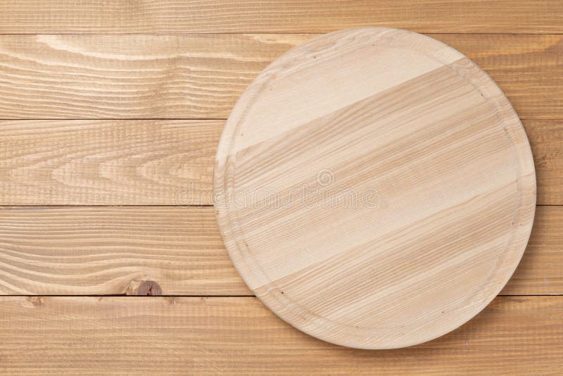 Round Wooden Cutting Board on Wooden Boards, Flat Lay, Empty Stock ...