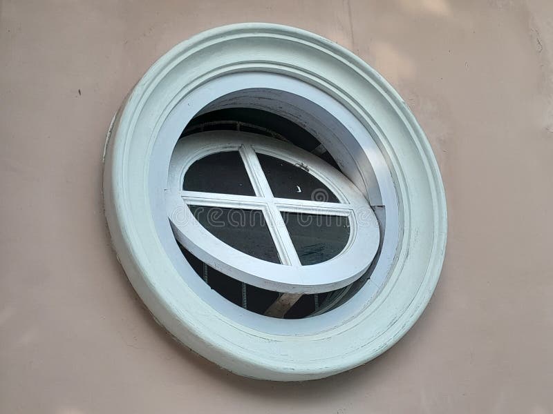 A Round Wooden Window with a Unique and Iconic Design that is so ...