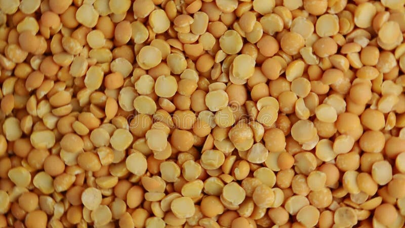 A Round Yellow Pea Rotates. Raw Yellow Peas. View from Above. Stock ...