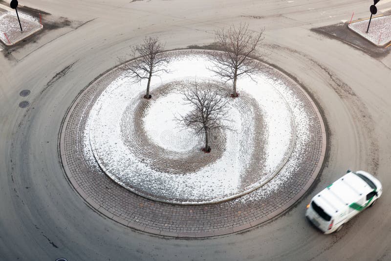 Top Down Aerial View of a Traffic Roundabout on a Main Road in an Urban ...