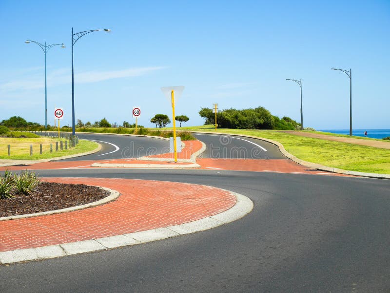 Roundabout and Speed Limit Signs Stock Photo - Image of bunbury, blue ...