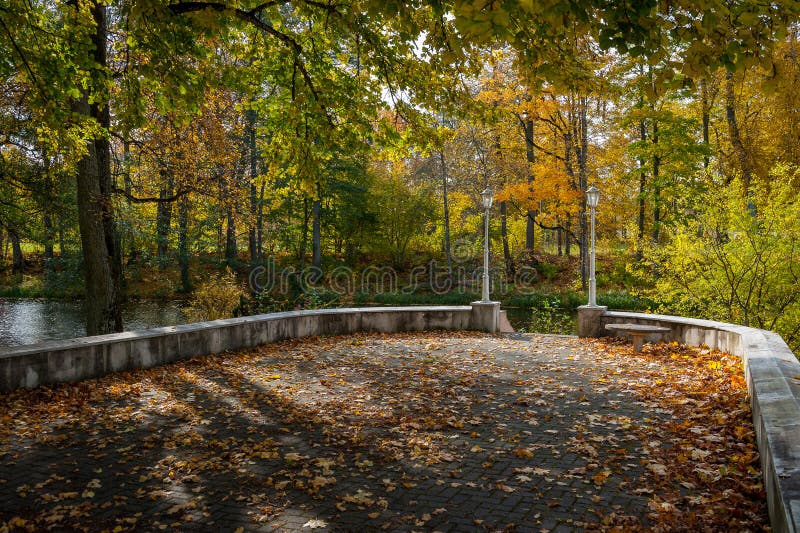 Rounded Diagonal Terrace by the Pond with Table and Two Lanterns. Stock ...
