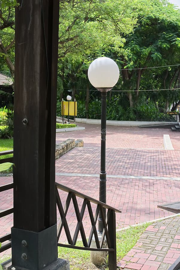 Rounded Lamp Post at Local Park Stock Photo - Image of glow, electric ...