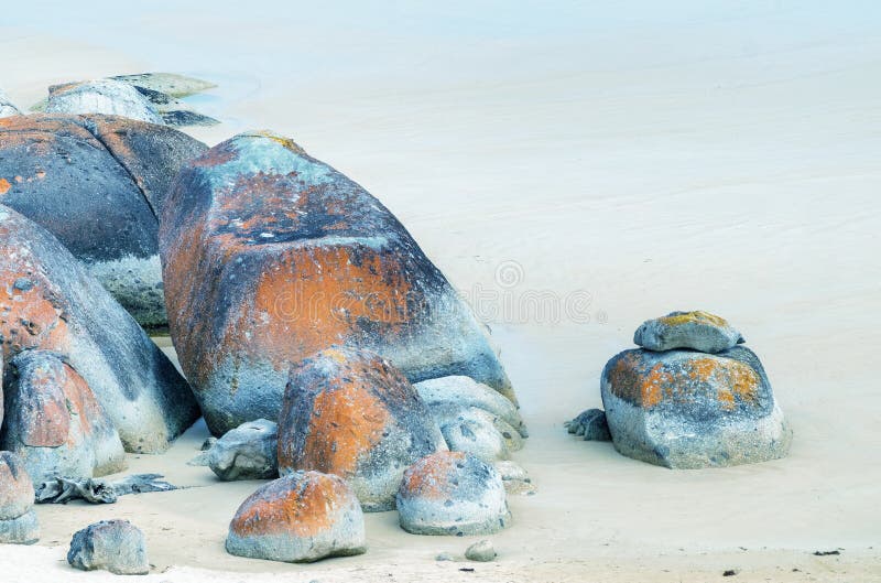Rounded Red Rocks in Wilsons Promontory - Squeaky Beach Stock Image ...