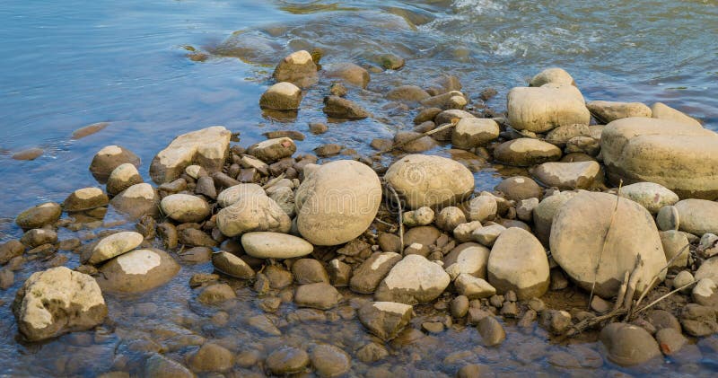 Rounded Rock on Flowing River Stock Image - Image of scenic, water ...